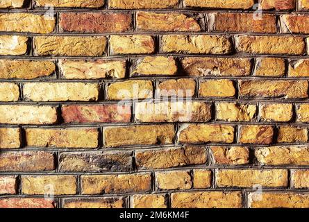 A brick wall, made of treated, antique-styled brick. High quality ...