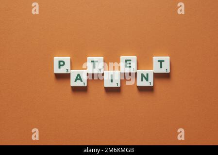 Patient formed of scrabble tiles Stock Photo - Alamy
