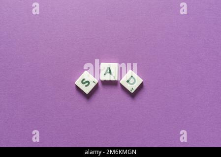 Sad formed of scrabble tiles Stock Photo - Alamy