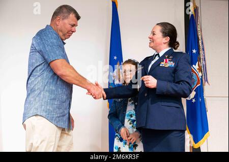 Gregg Englert, husband of newly retired U.S. Air Force Lt. Col. Melanie ...
