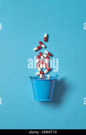 Bucket of Pills Stock Photo - Alamy