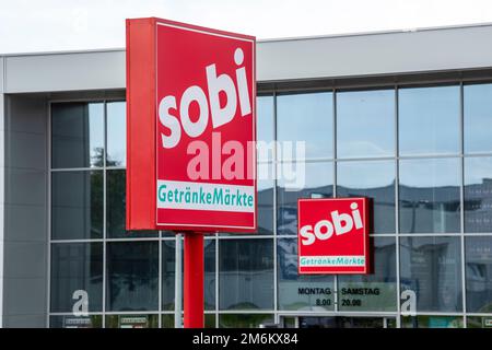 Advertising and company sign of Sobi beverage market Stock Photo - Alamy