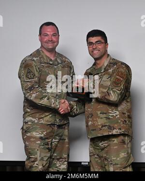 Col. Michael Parks, 507th Air Refueling Wing commander, pins the rank ...