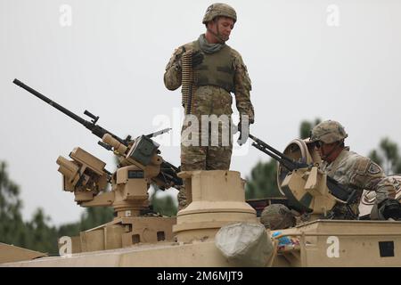 U.S. Army Sgt. Colby J. Kuberski, an M1 armor crewman gunner assigned ...