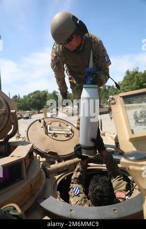 U.S. Army Sgt. Colby J. Kuberski, an M1 armor crewman gunner assigned ...