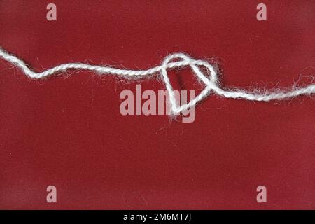 Woolen Yarn in Heart Shape with Copy Space Stock Photo - Alamy