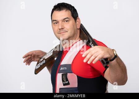Czech trap shooter Jiri Liptak poses for photographer with gold medal ...