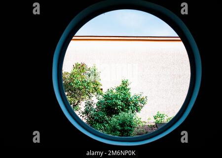 round window tree and house Stock Photo - Alamy