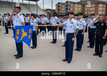 502nd Security Forces Group renders a salute during the 502nd Air Base ...