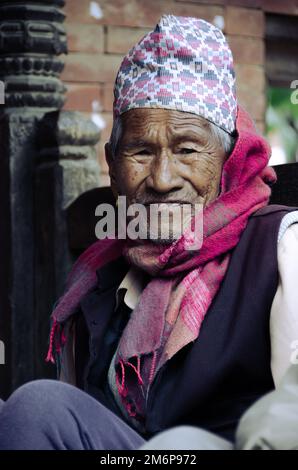 Faces of Nepal - Mature Men wearing Nepali topi Stock Photo - Alamy