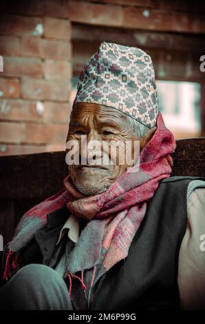 Faces of Nepal - Mature Men wearing Nepali topi Stock Photo - Alamy