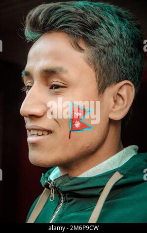 Faces of Nepal: Young Adult Man with Facial Paint Stock Photo - Alamy