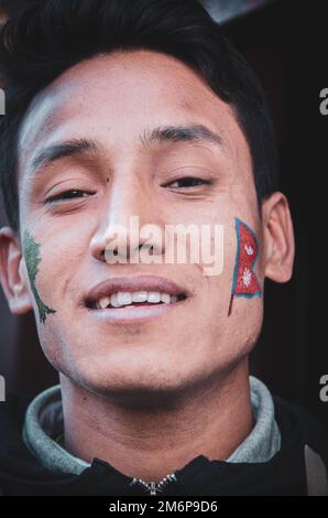 Faces of Nepal: Young Adult Man with Facial Paint Stock Photo - Alamy
