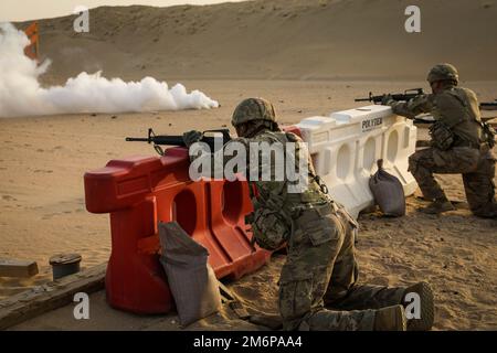 Soldiers from Task Force Spartan perform a combined fire mission with ...