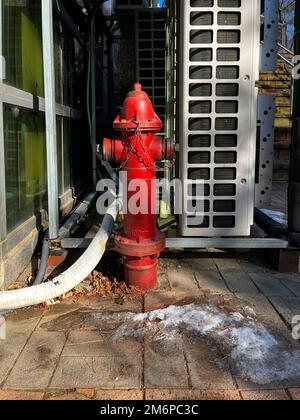 A red fire hydrant on the roadside Stock Photo - Alamy