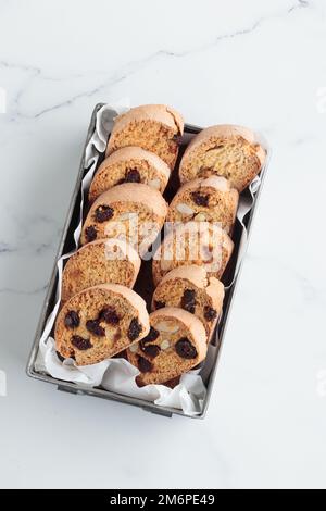 Biscotti in a metal box cantucci cookies with almond and cranberry on ...