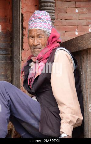 Faces of Nepal - Mature Men wearing Nepali topi Stock Photo - Alamy