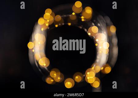 Fairy lights, led garland, overhead flat lay shot on a black background ...