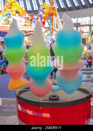 Rainbow Cotton Candy Floss Machine at Fun Fair Carnival Stock Photo - Alamy