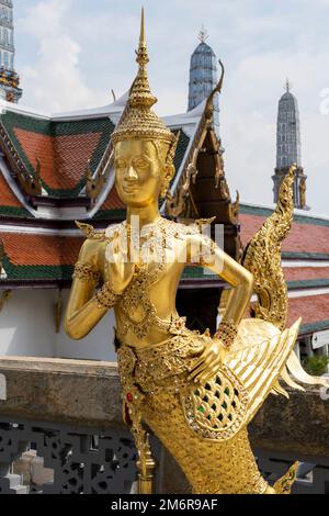 Statue of mythical creature Kinnari at Temple of Emerald Buddha in ...