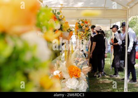 decor of different colors on the catering table Stock Photo - Alamy
