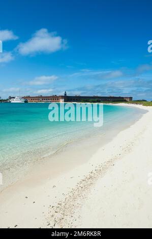 White sand beach with Fort Jefferson in the background, Dry Tortugas ...