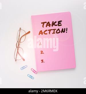 Sign displaying Take Action. Word for do something official or ...