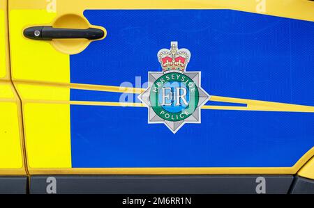 Logo and sign on a Merseyside police van Stock Photo - Alamy