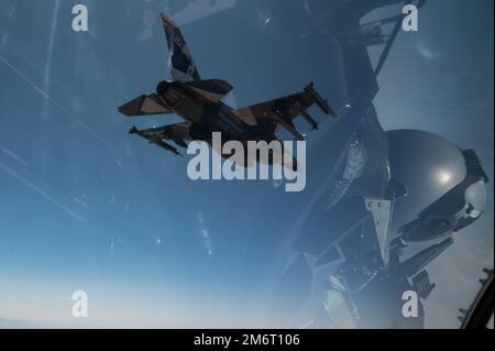 Captain Joshua Smith, 706th Fighter Squadron pilot, listen to his crew ...