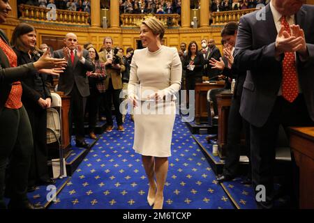 Massachusetts Governor Maura Healey greets lawmakers as she arrives for her inauguration in the ...