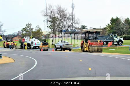 Workers with Mathy Construction of Onalaska, Wis., complete road ...