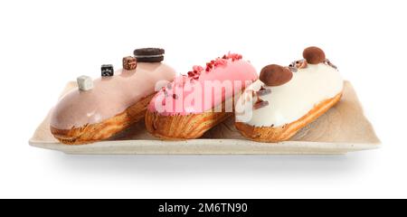 Plate with various glazed eclairs isolated on white background Stock ...