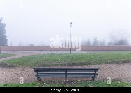 A bench along the Janiculum promenade in Rome shrouded in fog (Photo by ...