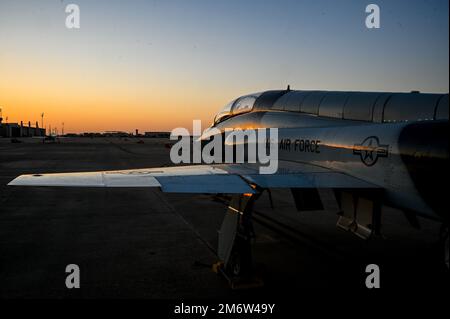 A T-38 Talon is parked on the flightline during a sunset at Laughlin ...