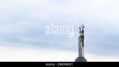 Statue of the Motherland against the blue sky. The highest statue in ...