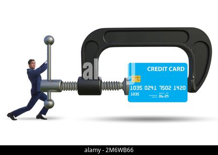 Concept of credit card debt with the clamp and businessman Stock Photo ...