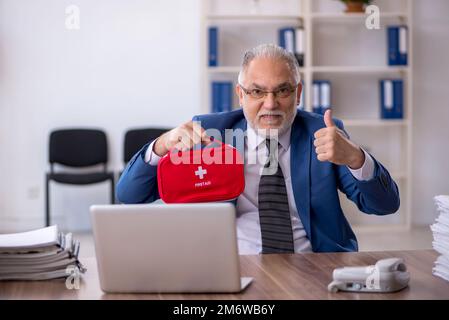 Old businessman employee feeling bad at workplace Stock Photo - Alamy