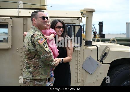 U.S. Army Col. Robert Paoletti poses with his family before his ...