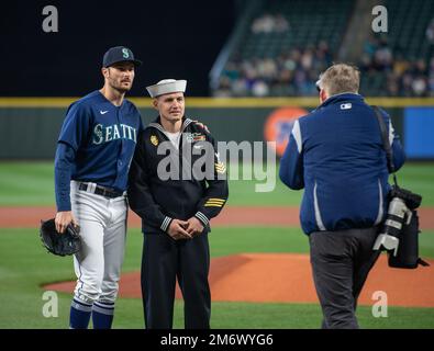 Seattle Mariners pitcher Wyatt Mills throws during spring training ...