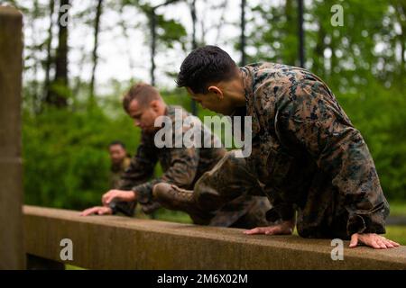 U.S. Marines with The Basic School jump off the tower during their ...