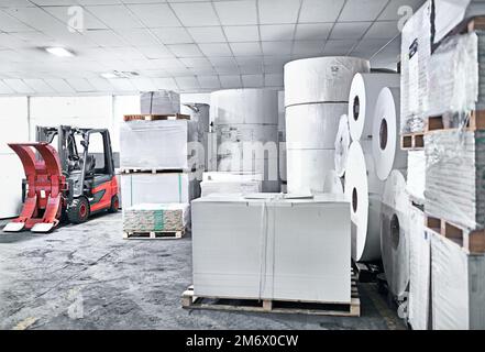 plastic rolls inside plastic packaging factory with industrial machine ...