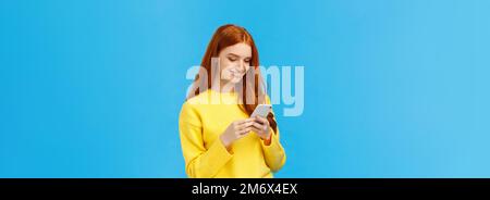 Conversation, messaging and people concept. Redhead cute carefree girl ...