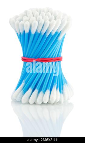 Pile of white cotton swabs isolated on wood background Stock Photo - Alamy