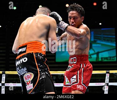 WBO super flyweight champion Kazuto Ioka of Japan (R) and WBA champion Joshua Franco of the ...