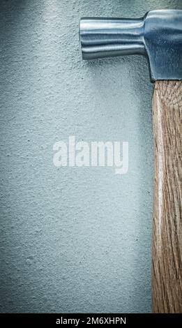 Construction claw hammer on concrete background Stock Photo - Alamy