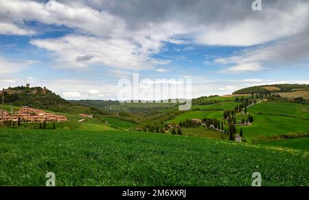 View on the traditional Tuscan farm with cypress trees alley Stock ...
