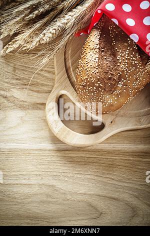 Bread rye ears red polka-dot napkin quill vintage scroll on wooden ...