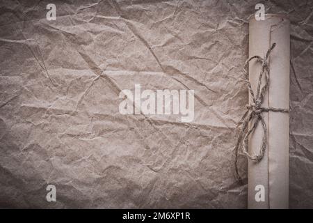 Medieval paper scroll on crumpled wrapping sheet Stock Photo - Alamy