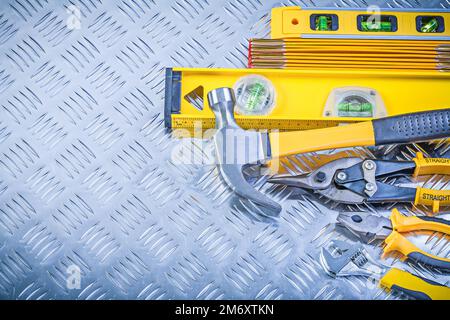 Composition of construction tooling on corrugated metal sheet ...