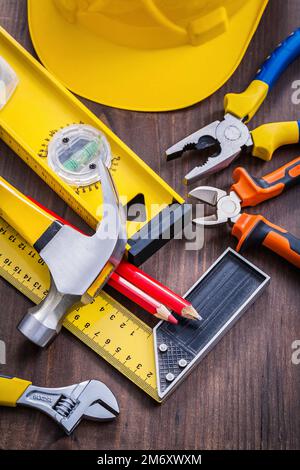 square ruller helmet hammer nippers pliers wrench tapeline pencils o ...